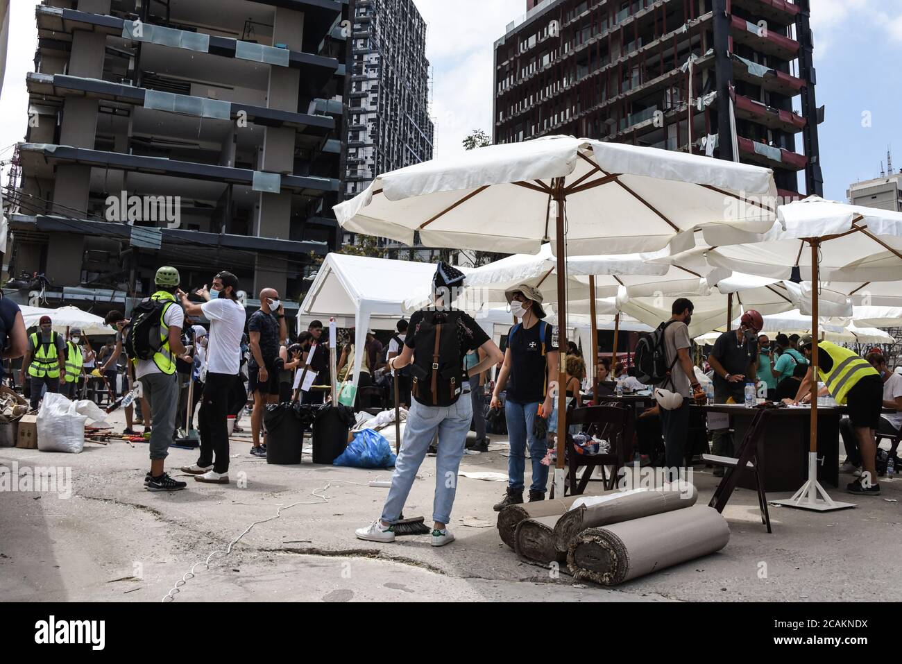 Beirut, Lebanon, 7 August 2020. Volunteer crews organising the clean up ...