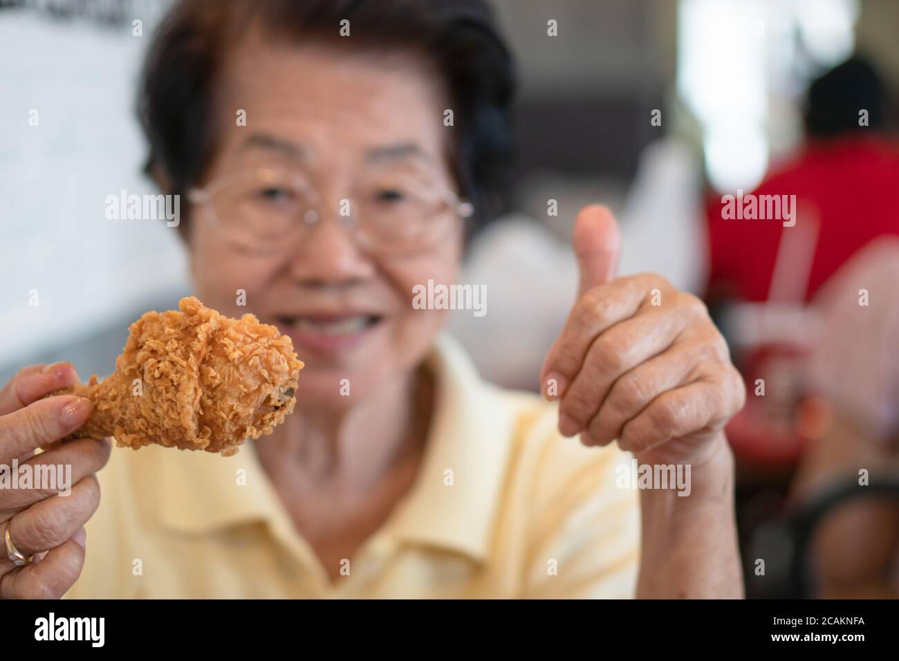 Woman fried chicken portrait hi-res stock photography and images - Alamy
