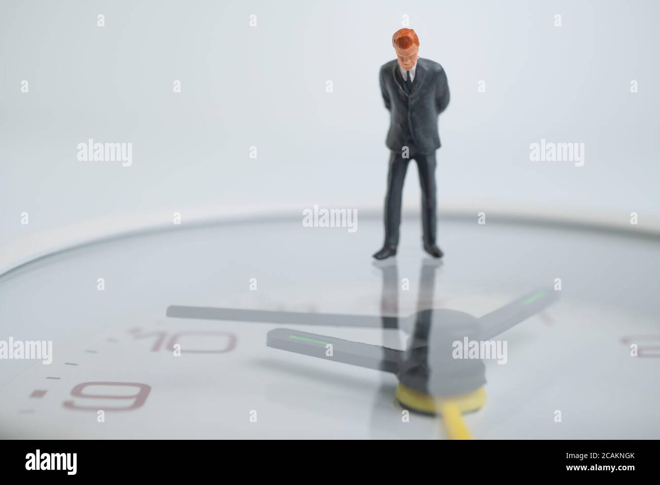 Figure businessmen are looking and thinking and standing on the white ...