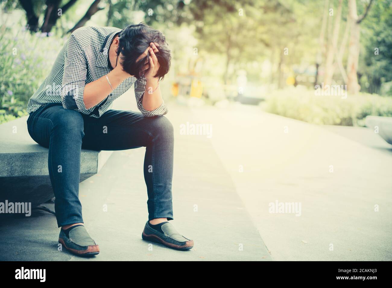Negative emotion facial expression feelings. Stressed Asian businessman ...
