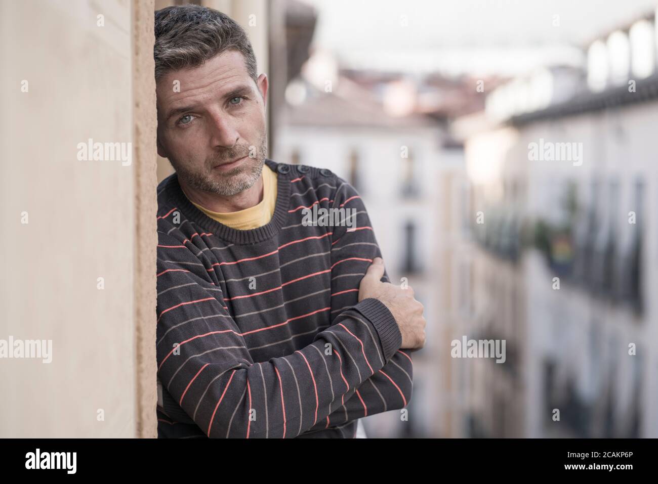 urban lifestyle emotional portrait of 40s handsome man sad and ...