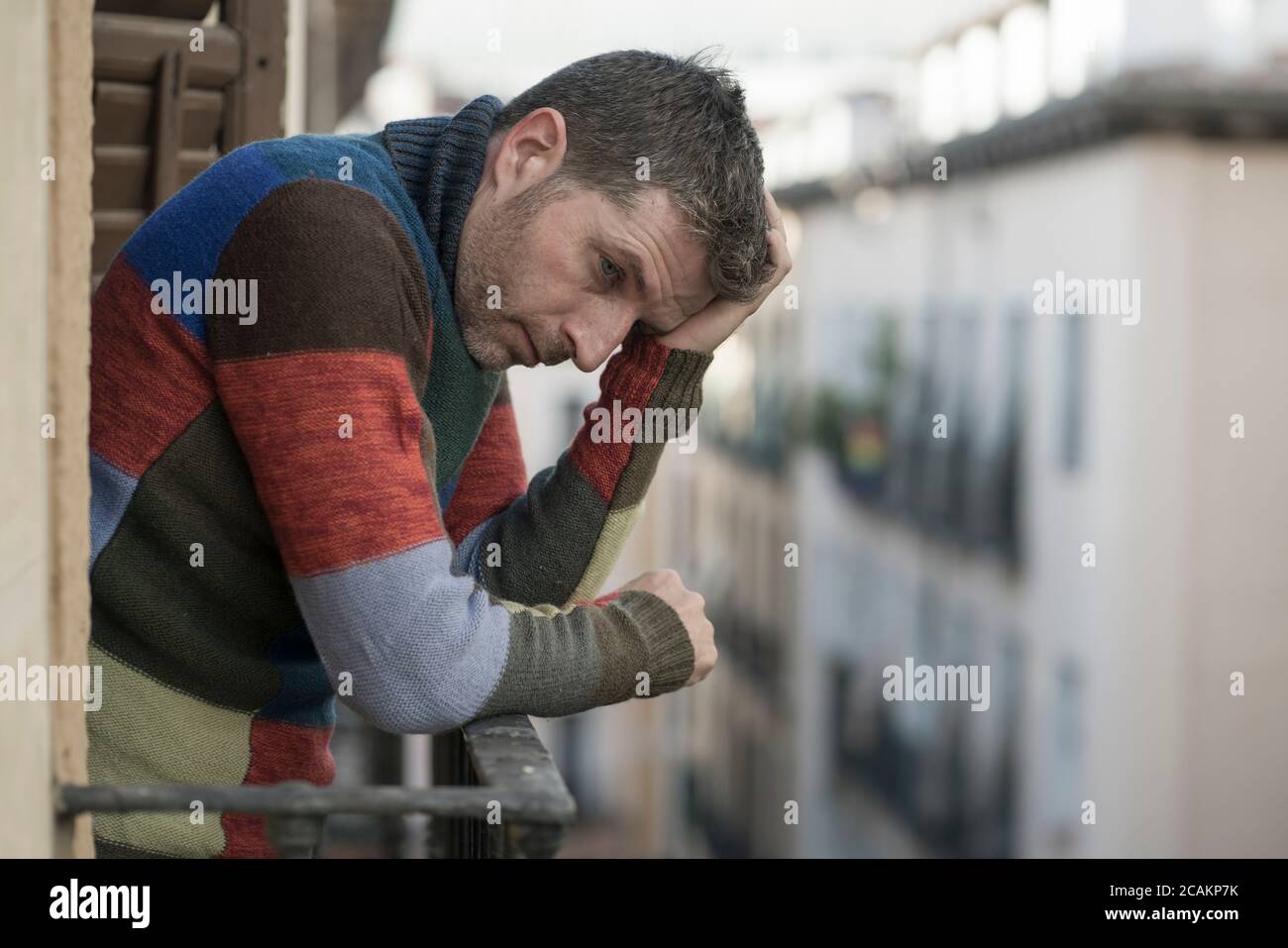 urban lifestyle emotional portrait of 30s handsome man sad and ...