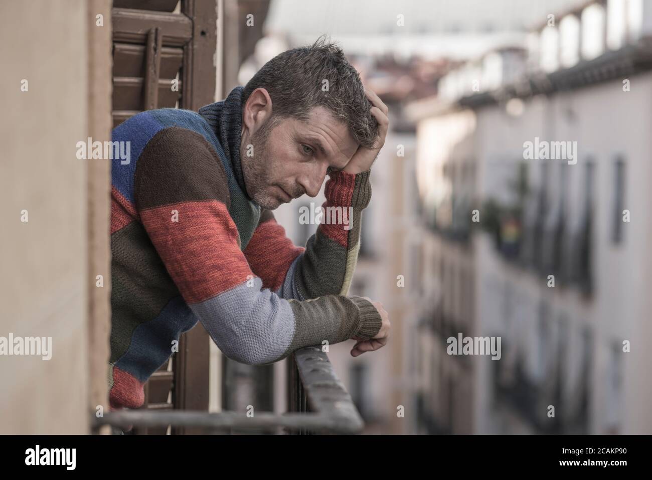 urban lifestyle emotional portrait of 40s handsome man sad and ...