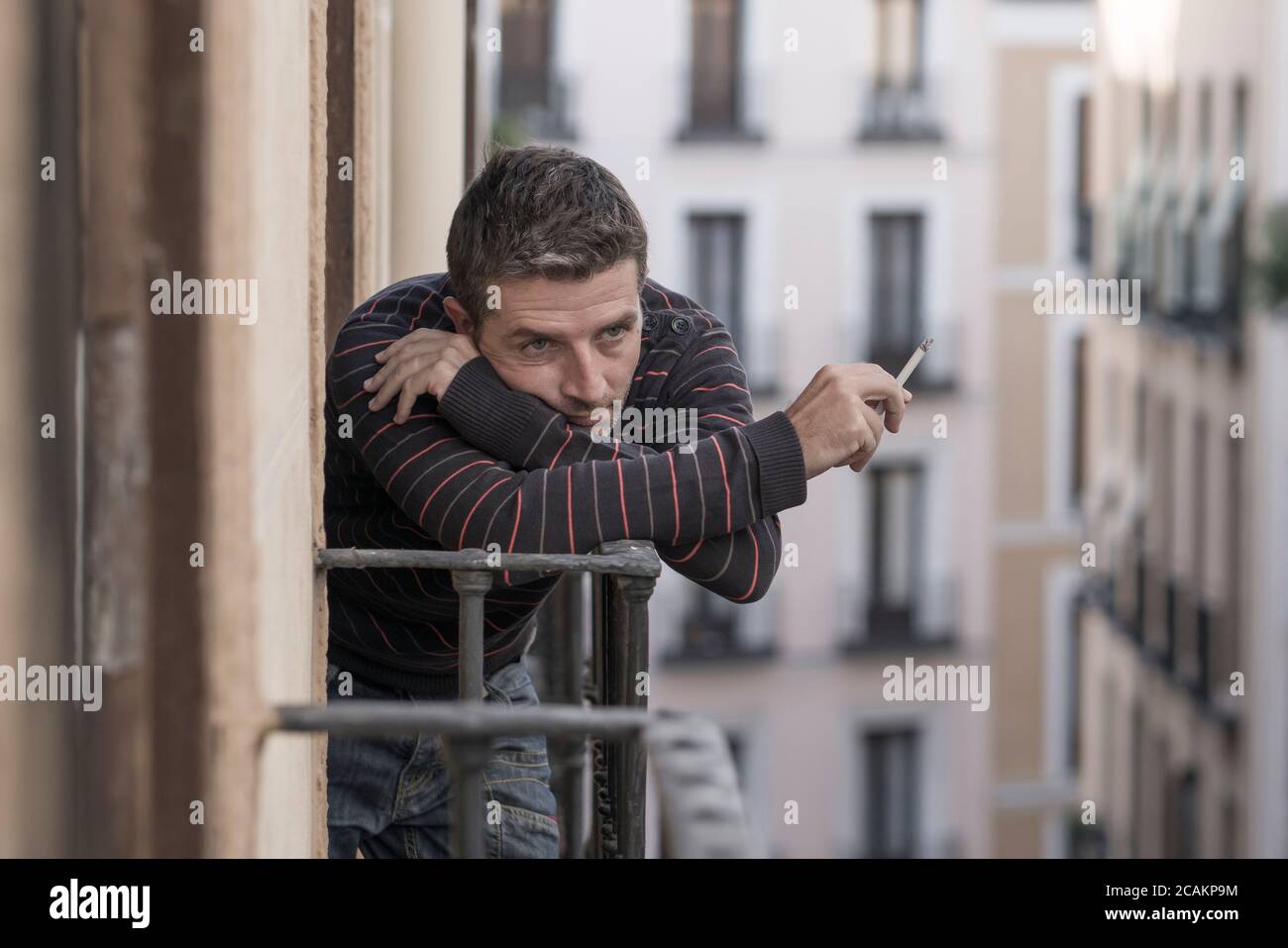 urban lifestyle emotional portrait of young handsome man sad and ...