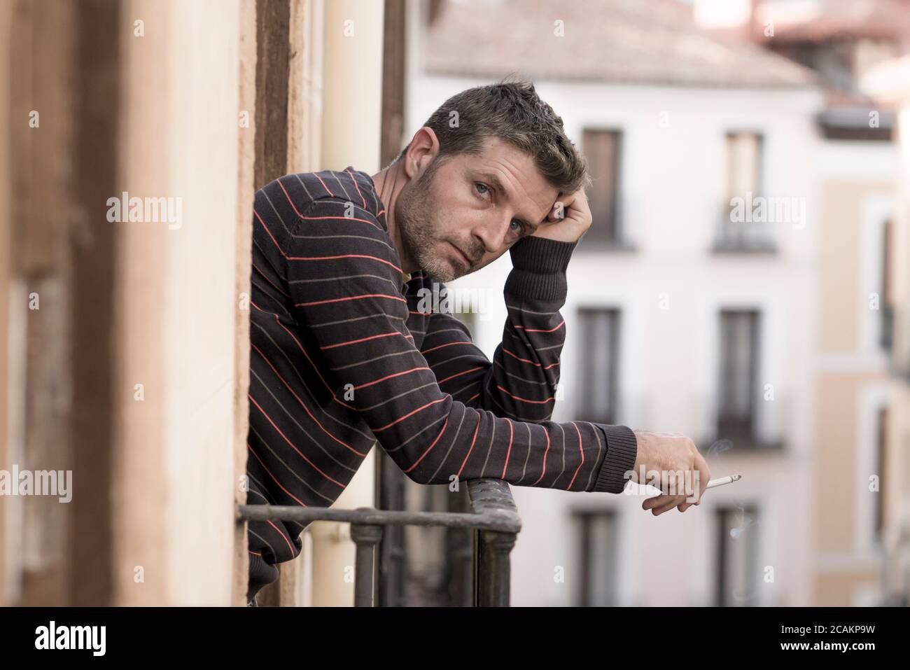 urban lifestyle emotional portrait of young handsome man sad and ...
