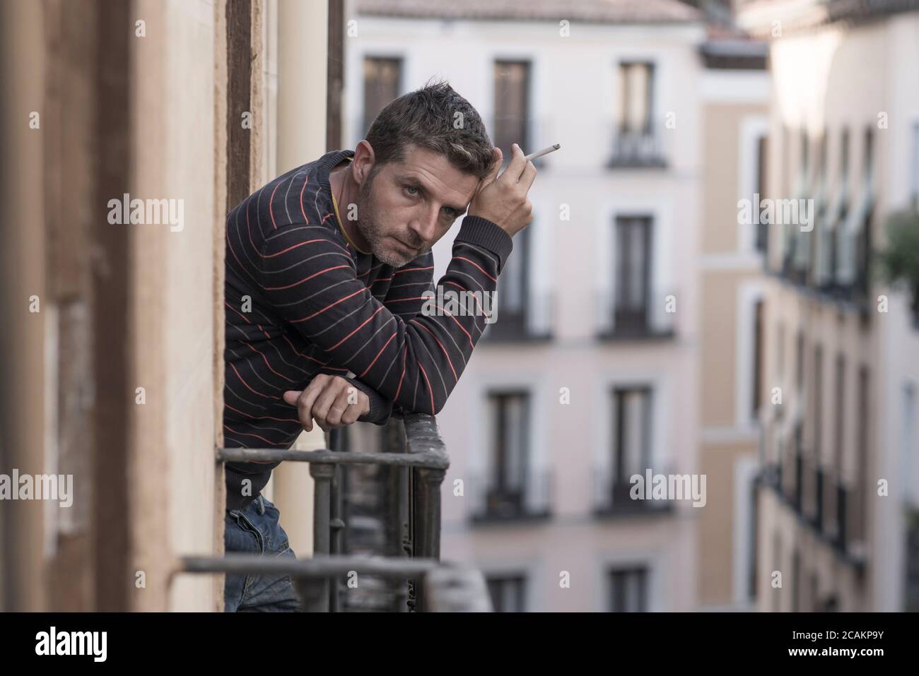 urban lifestyle emotional portrait of young handsome man sad and ...
