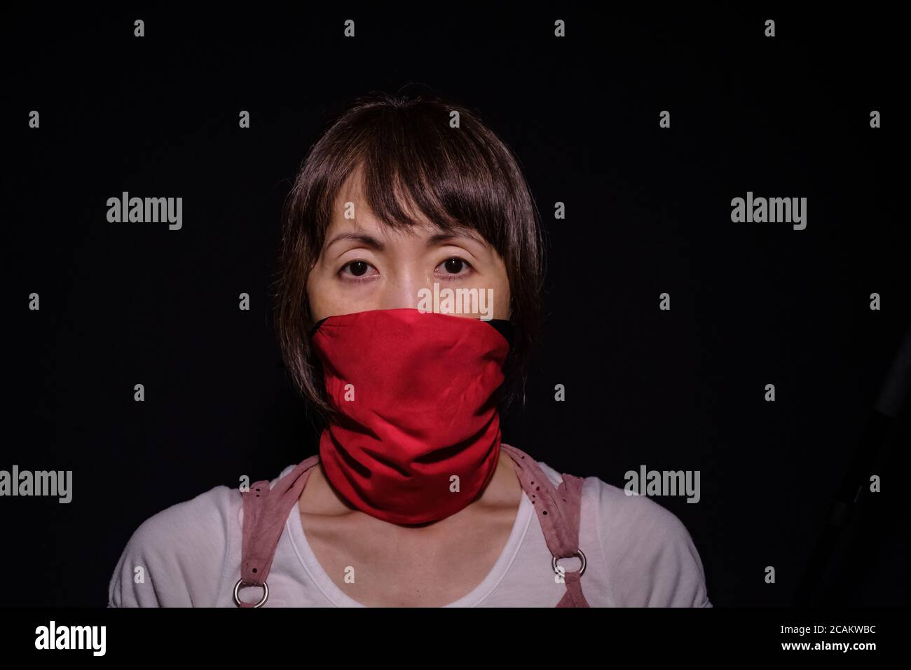 Japanese girl in a mask Stock Photo - Alamy