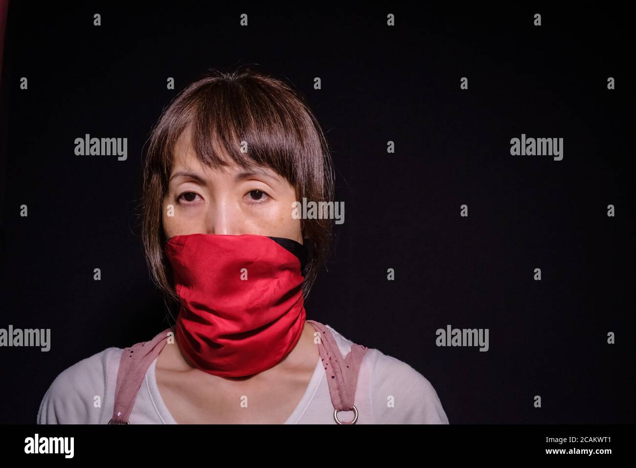 Japanese girl in a mask Stock Photo - Alamy