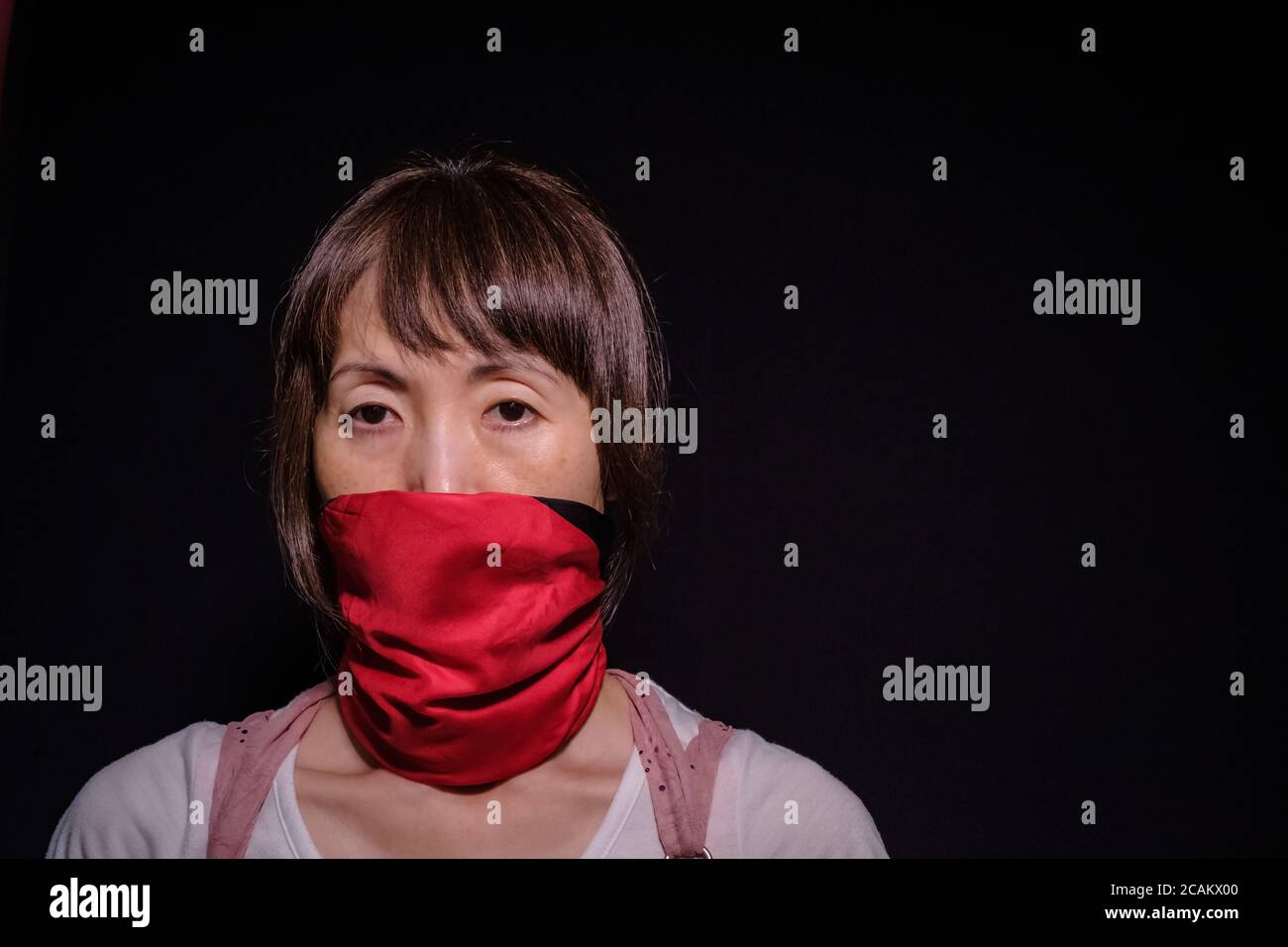 Japanese girl in a mask Stock Photo - Alamy