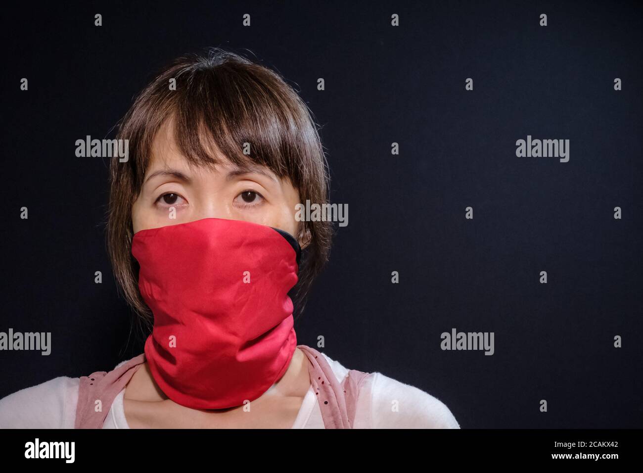Japanese girl in a mask Stock Photo - Alamy