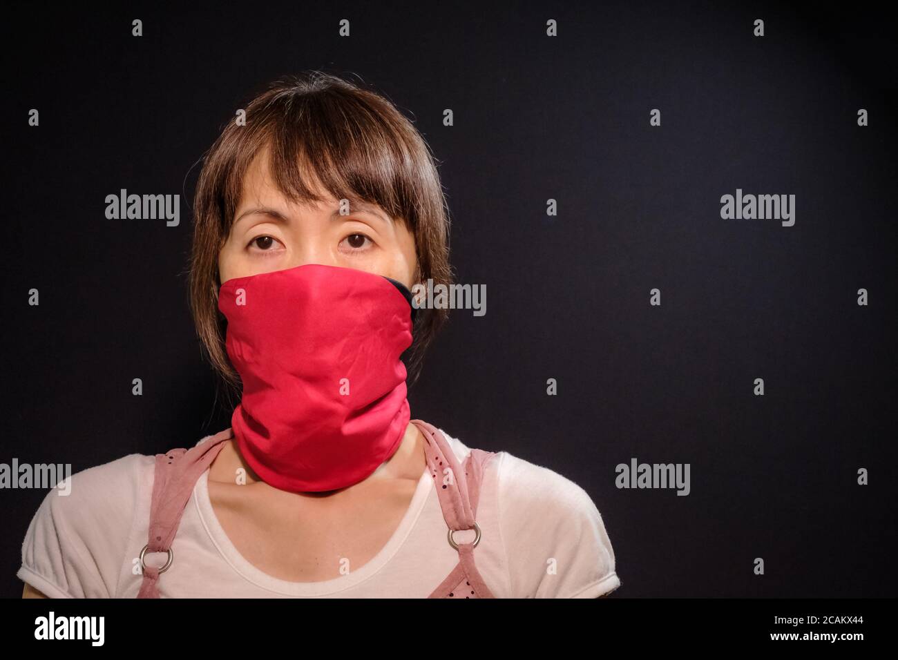 Japanese girl in a mask Stock Photo - Alamy