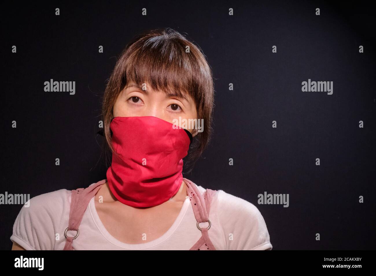 Japanese girl in a mask Stock Photo - Alamy