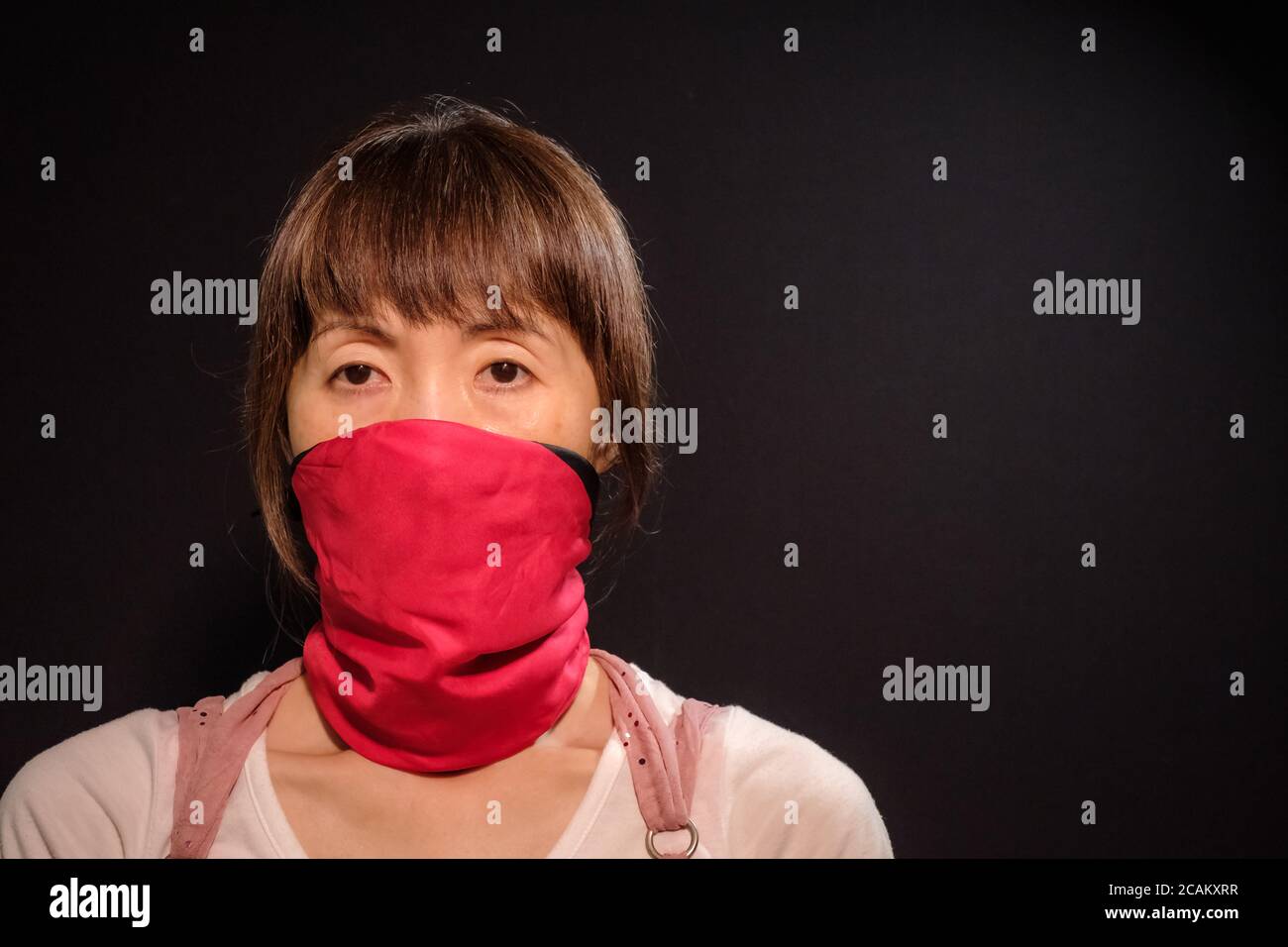 Japanese girl in a mask Stock Photo - Alamy