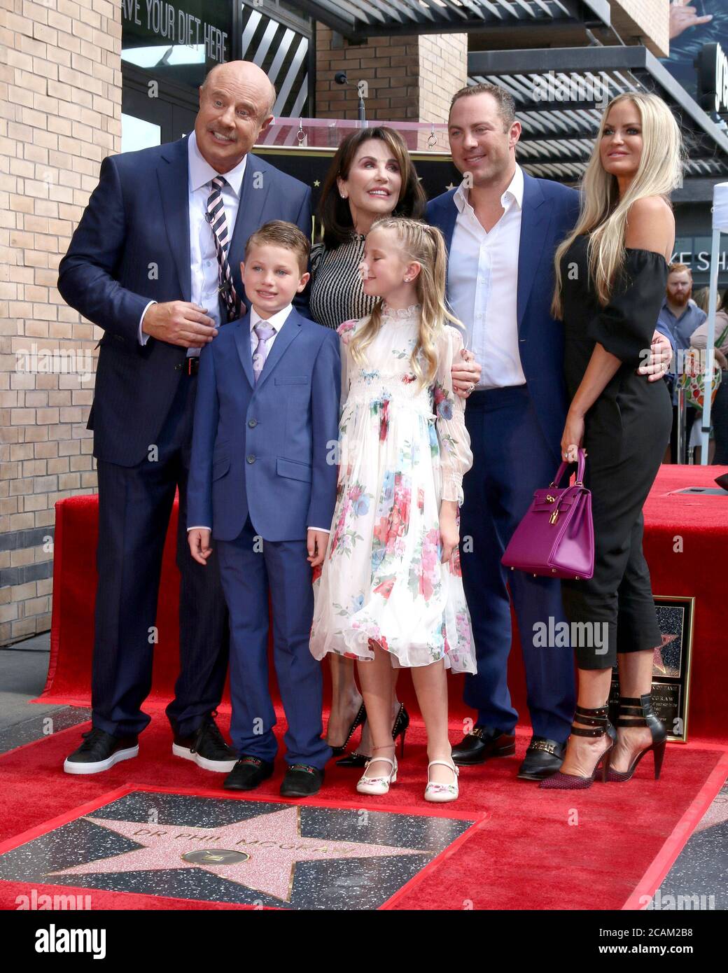 LOS ANGELES - FEB 21: Dr Phil McGraw, London McGraw, Robin McGraw ...