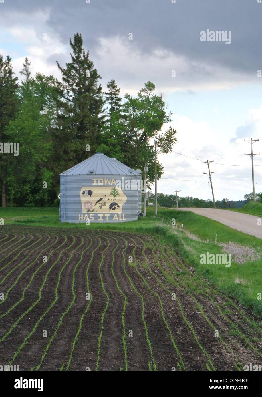landscape photo of iowa farm with ploughed farm along hwy 30 with sign ...