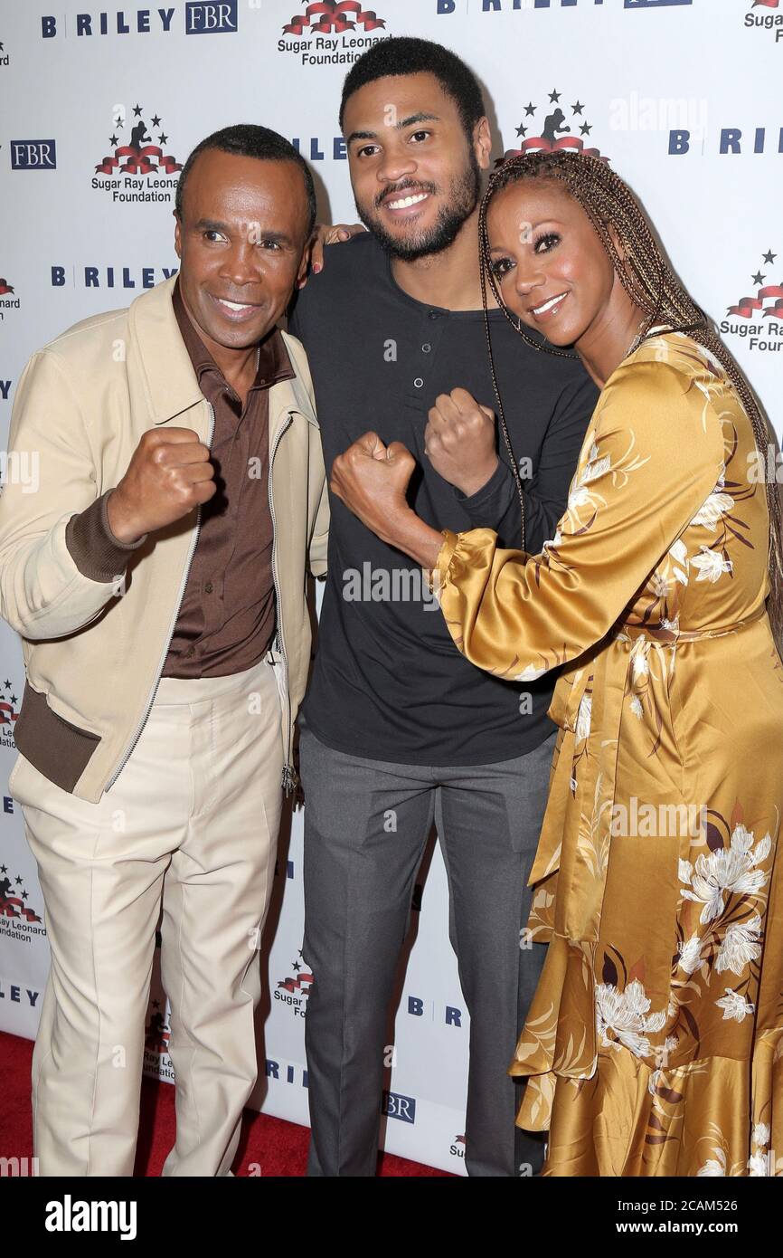 LOS ANGELES - MAY 22: Sugar Ray Leonard, RJ Peete, Holly Robinson Peete ...