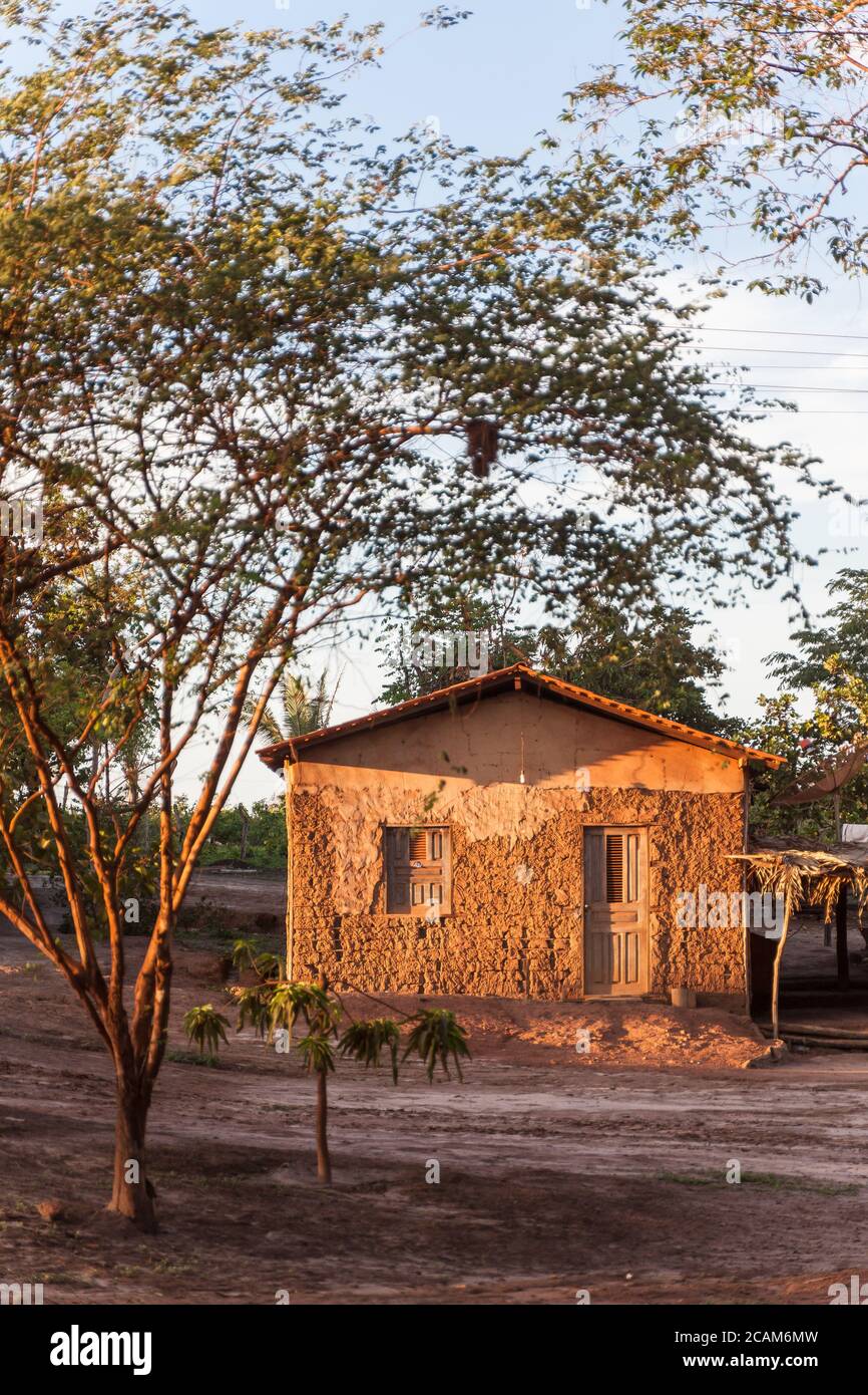 Poor mud house at sunset - Maranhao State, Brazil Stock Photo - Alamy