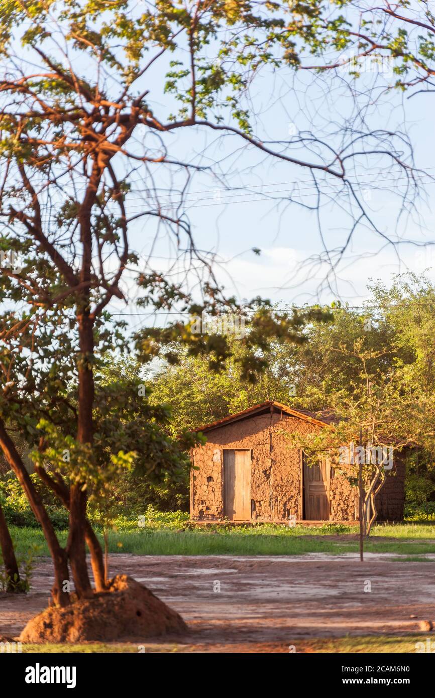 Poor mud house at sunset - Maranhao State, Brazil Stock Photo - Alamy