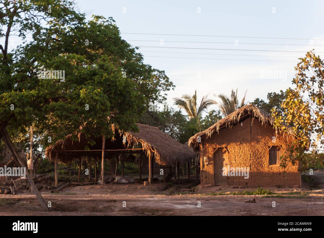 Poor mud house at sunset - Maranhao State, Brazil Stock Photo - Alamy