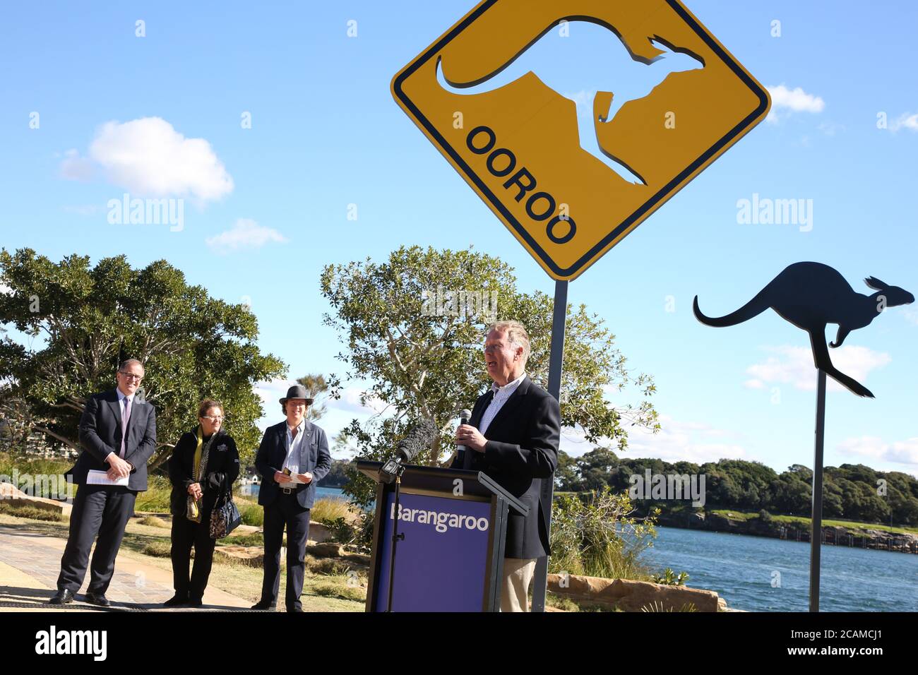 Pictured: Exhibition curator Geoffrey Edwards speaking at the media ...