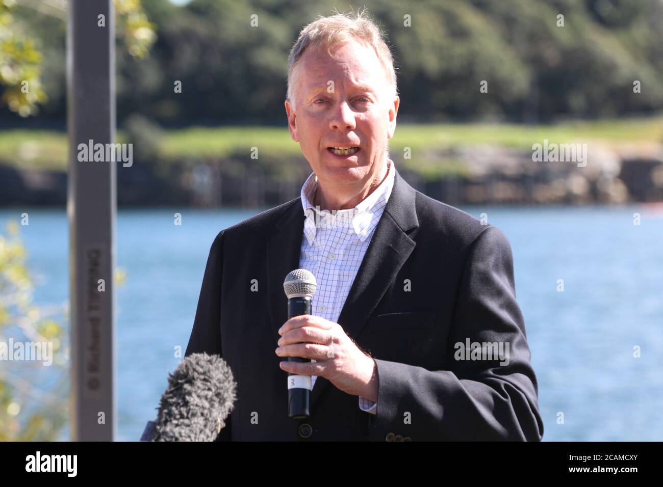 Pictured: Exhibition curator Geoffrey Edwards speaking at the media ...
