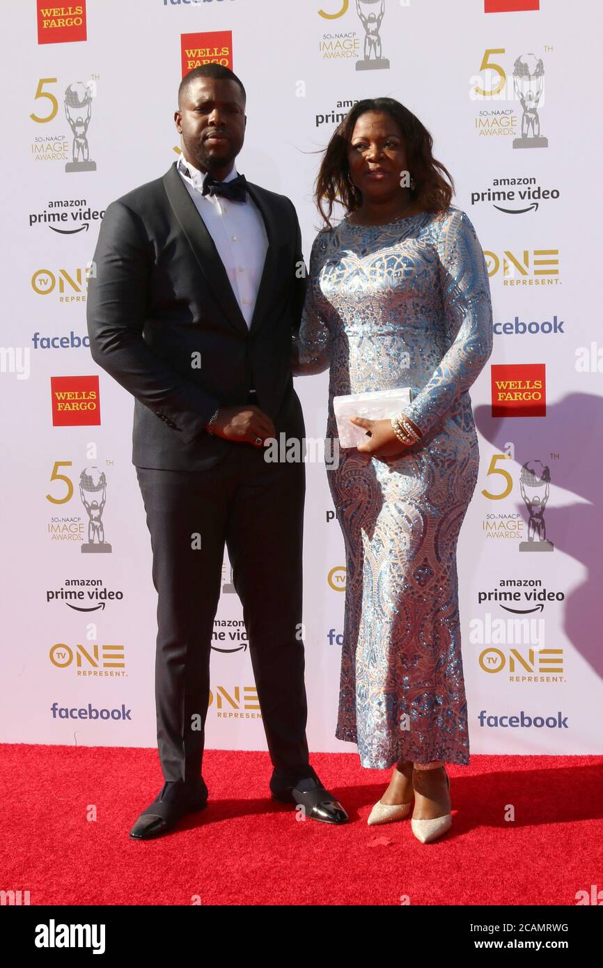 LOS ANGELES - MAR 30: Winston Duke, sister at the 50th NAACP Image ...