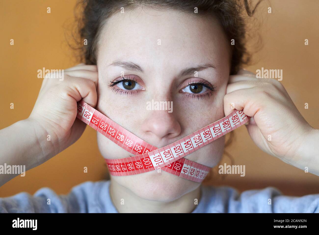 Young woman arms wrapped around hi-res stock photography and images - Alamy