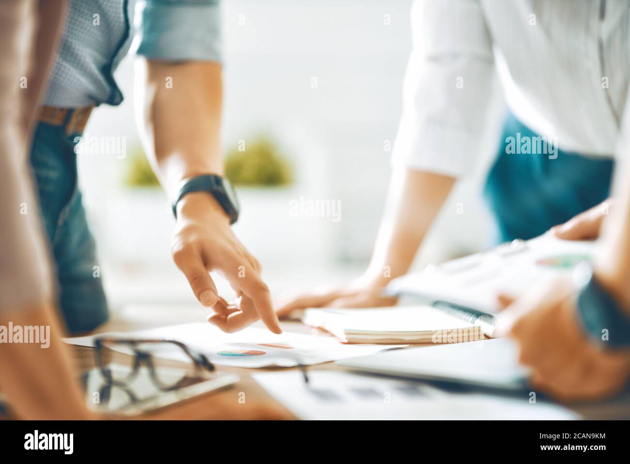 Working day in office. Collaborative teamwork Stock Photo - Alamy