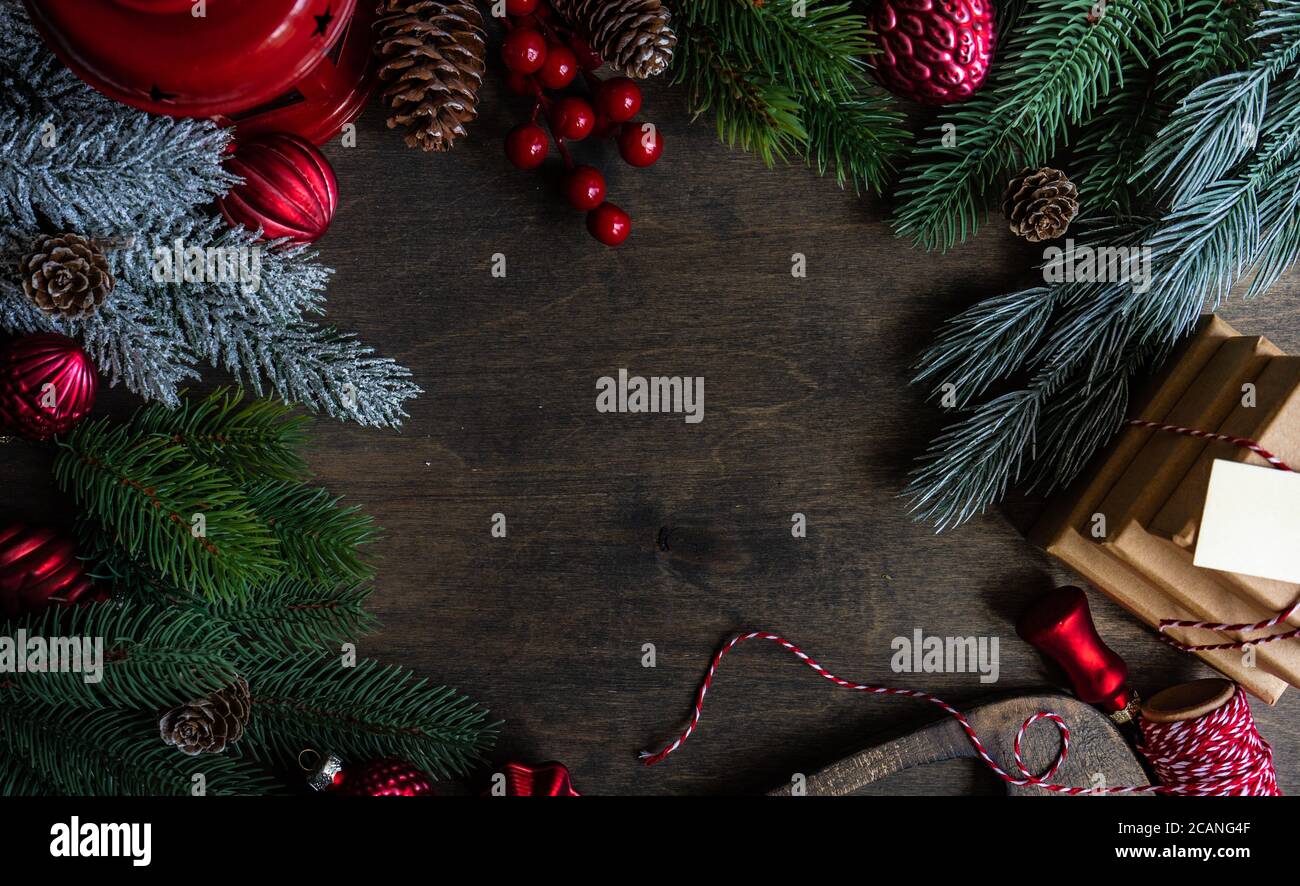 Christmas frame concept with xmas tree branches and decoration on ...