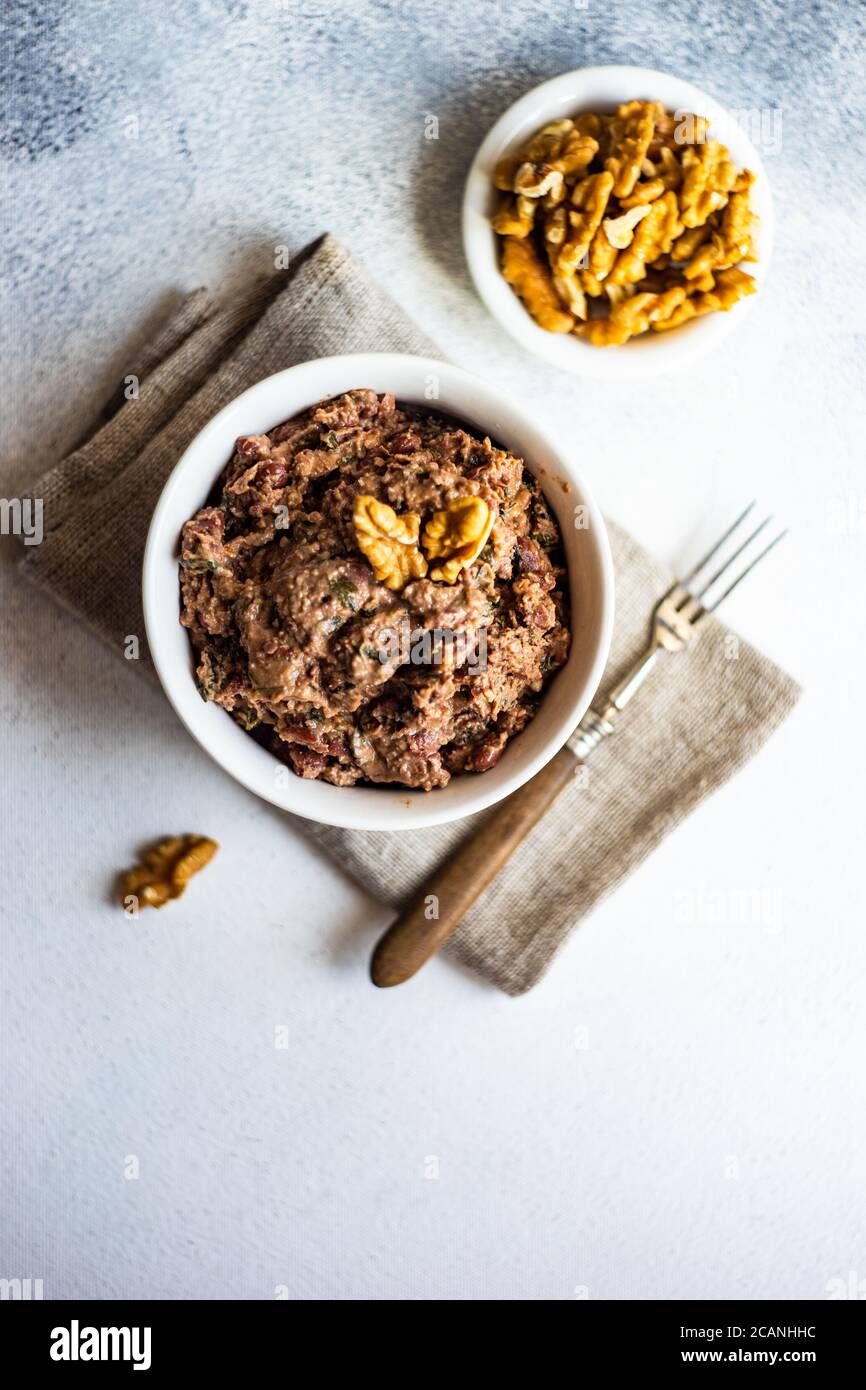 Traditional georgian bean dish - lobio with walnut, served in modern ...