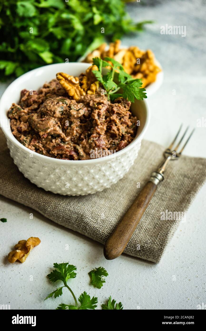 Traditional georgian bean dish - lobio with walnut, served in modern ...