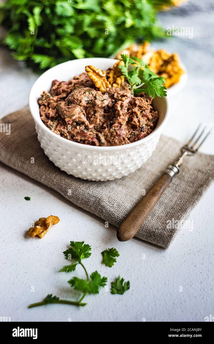 Traditional georgian bean dish - lobio with walnut, served in modern ...