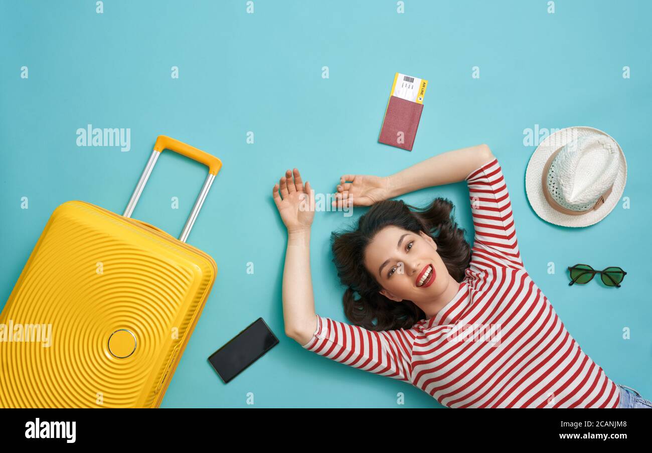 Go on an adventure! Happy woman going traveling. Young person with ...