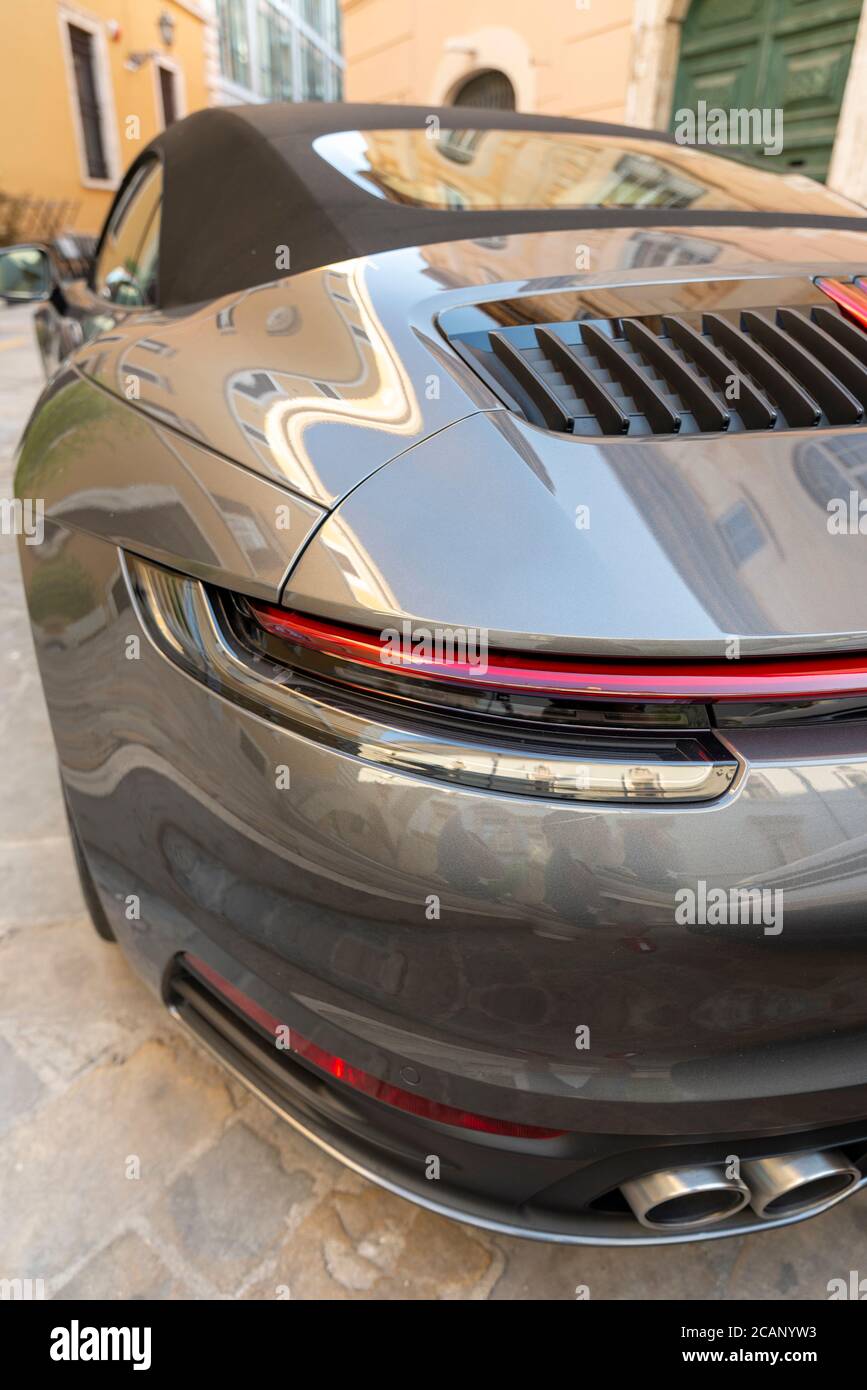 detail of the left rear of a sports car with headlight Stock Photo - Alamy