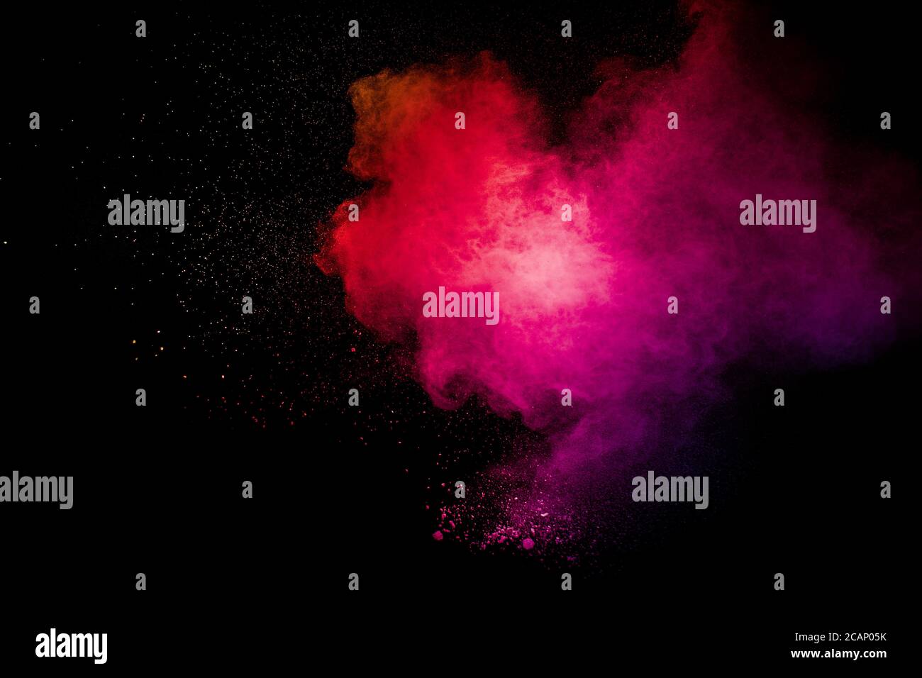 Pink dust particles splash on black background.Pink powder splash Stock ...