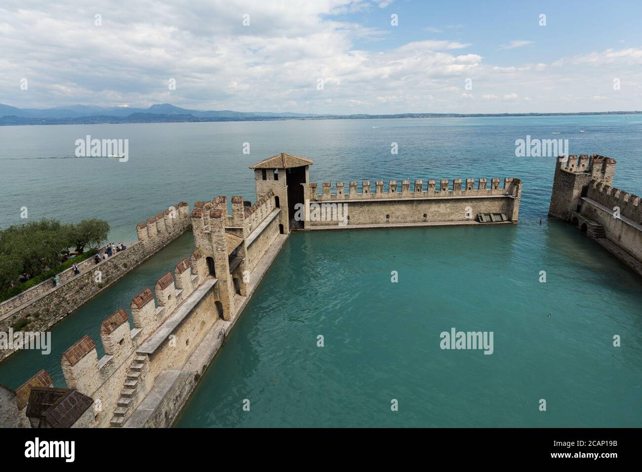 Backwater inside the Scaliger Castle - medieval port fortress, Sirmione ...