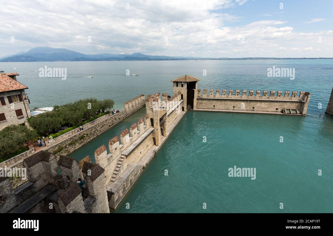 Backwater inside the Scaliger Castle - medieval port fortress, Sirmione ...
