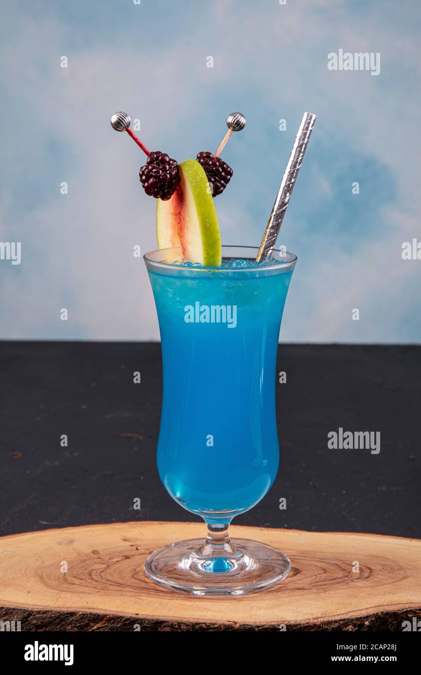 Blue Lagoon Blue Hawaiian Cocktail Vodka Alcoholic Drink. Iced blue ...