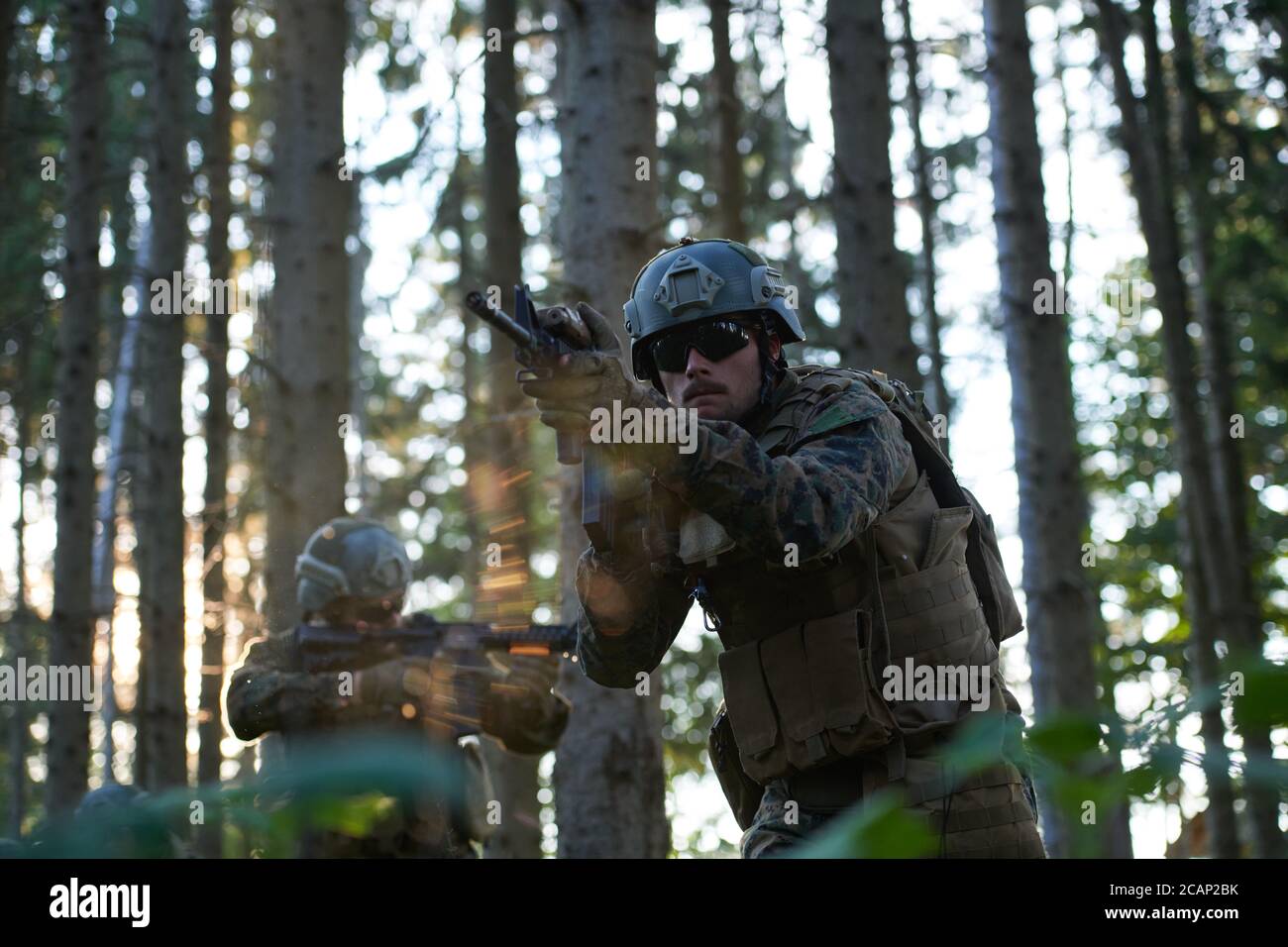 Modern warfare Soldiers Squad Running as Team in Battle Formation Stock ...