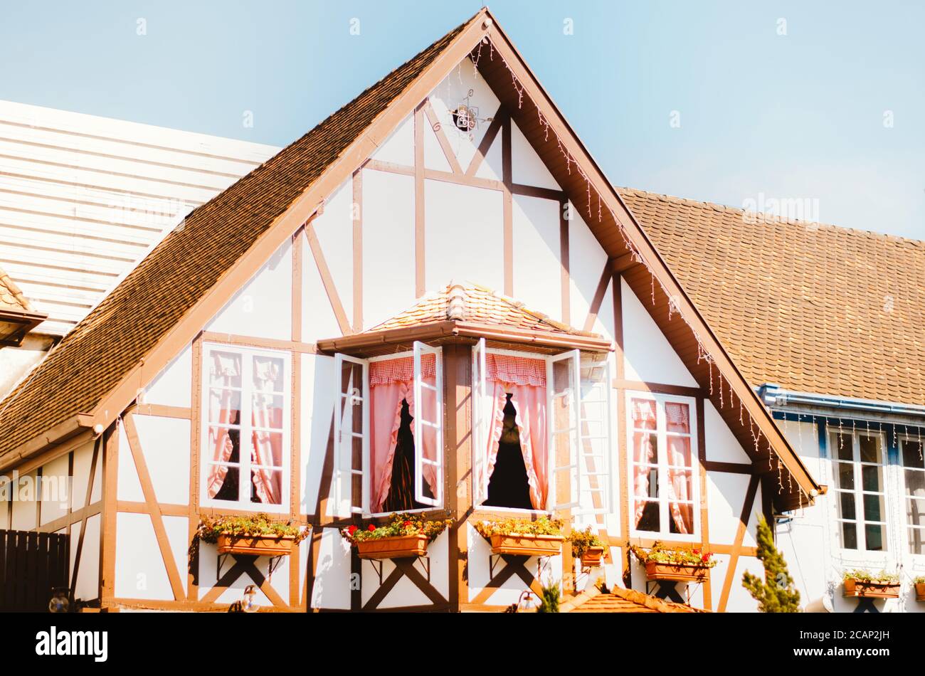 Front view of a gorgeous colonial german house and its windows ...
