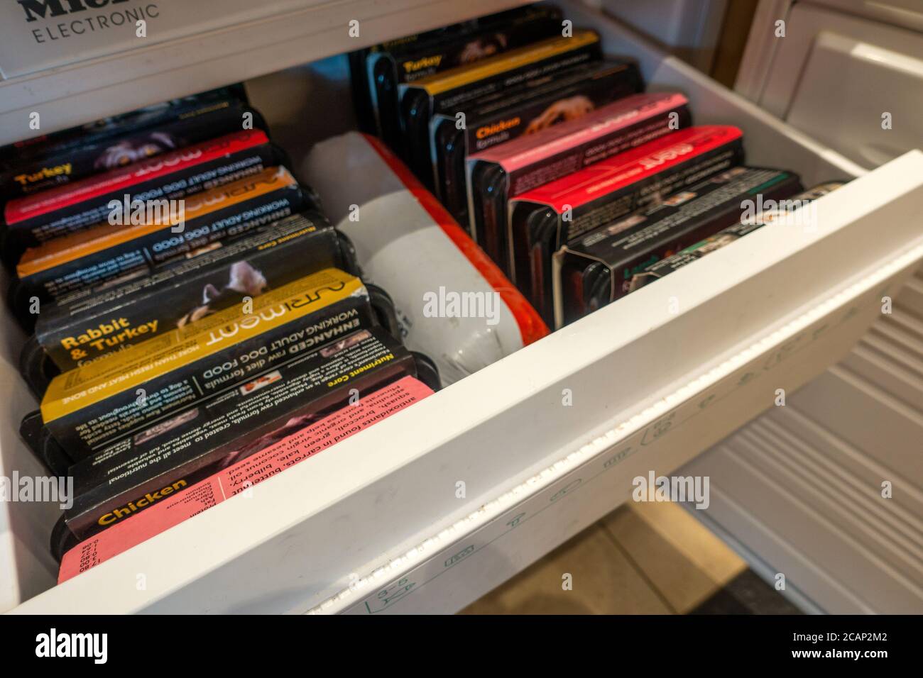 open fridge freezer draw showing the frozen contents Stock Photo - Alamy