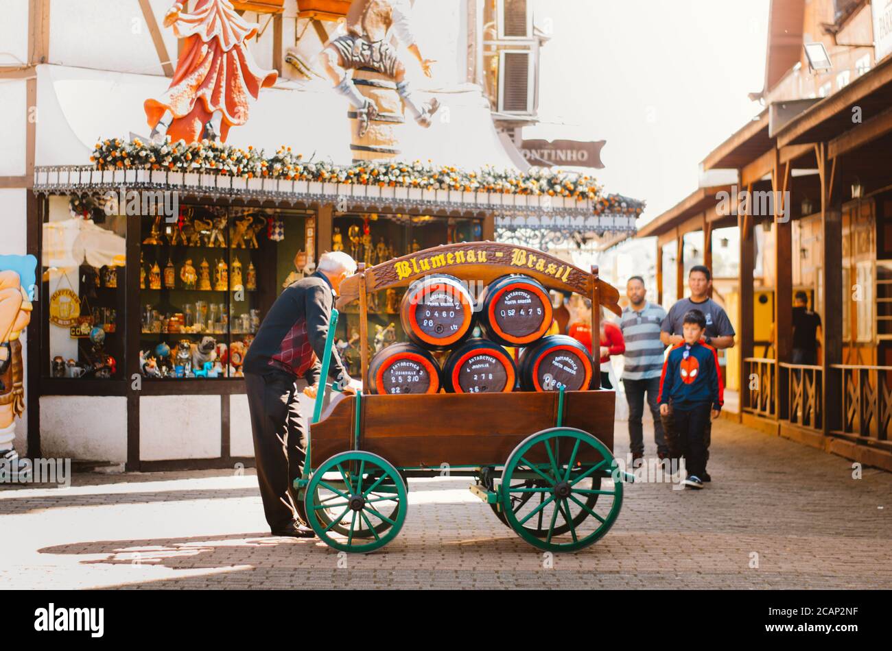 Decorative wooden beer barrels in front of a of a gorgeous colonial ...