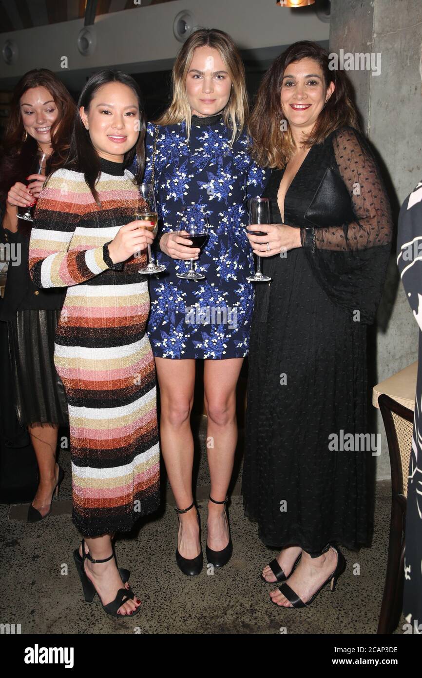 L-R: Alyce Tran, Brooke Testoni & tbc attends the Harper's BAZAAR ...