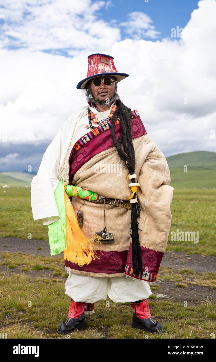 Sertar, China's Sichuan Province. 7th Aug, 2020. A man takes part in a ...