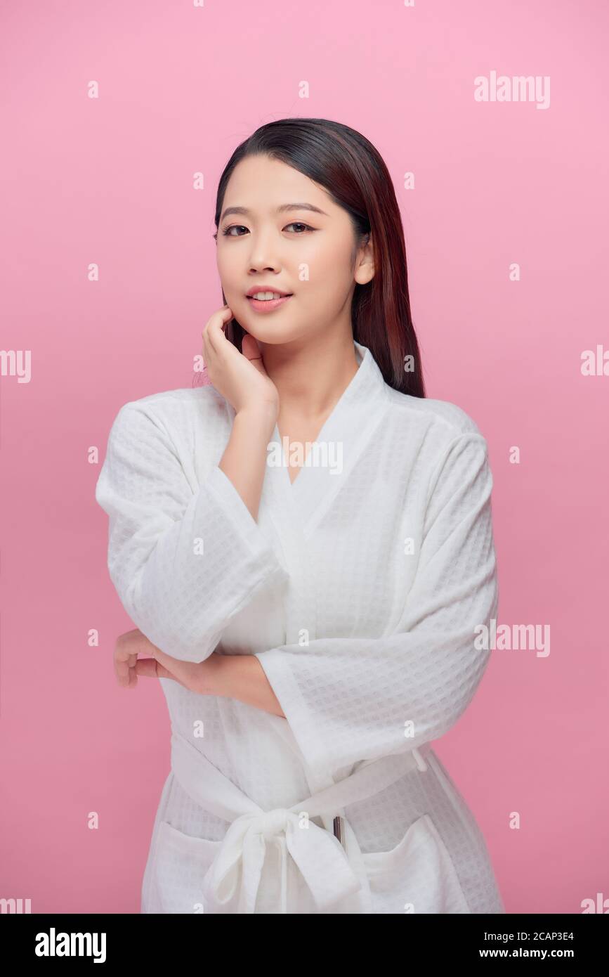 Beauty skin care woman touch her chin and smile Stock Photo - Alamy