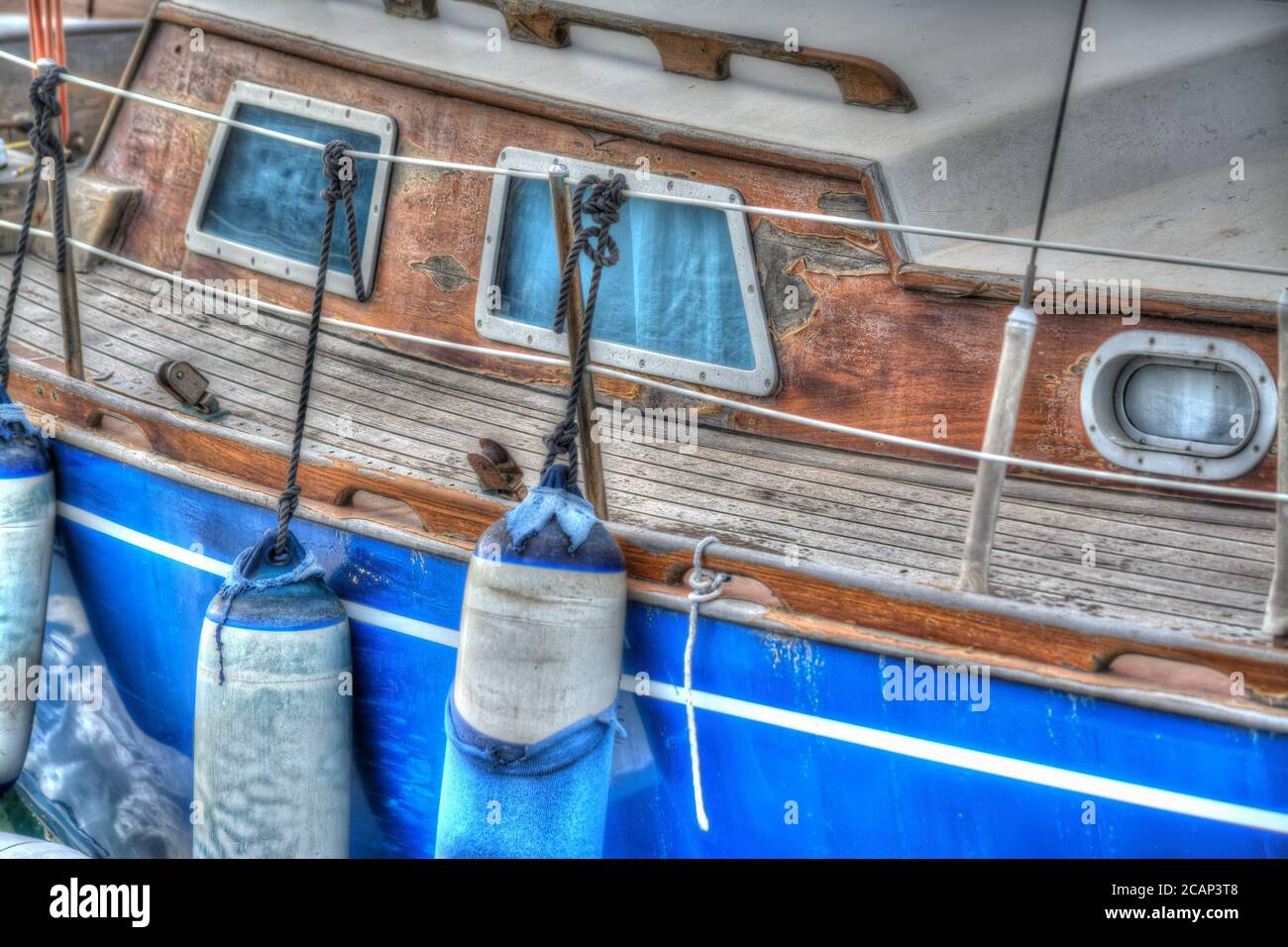 White wooden boat and fenders hi-res stock photography and images - Alamy