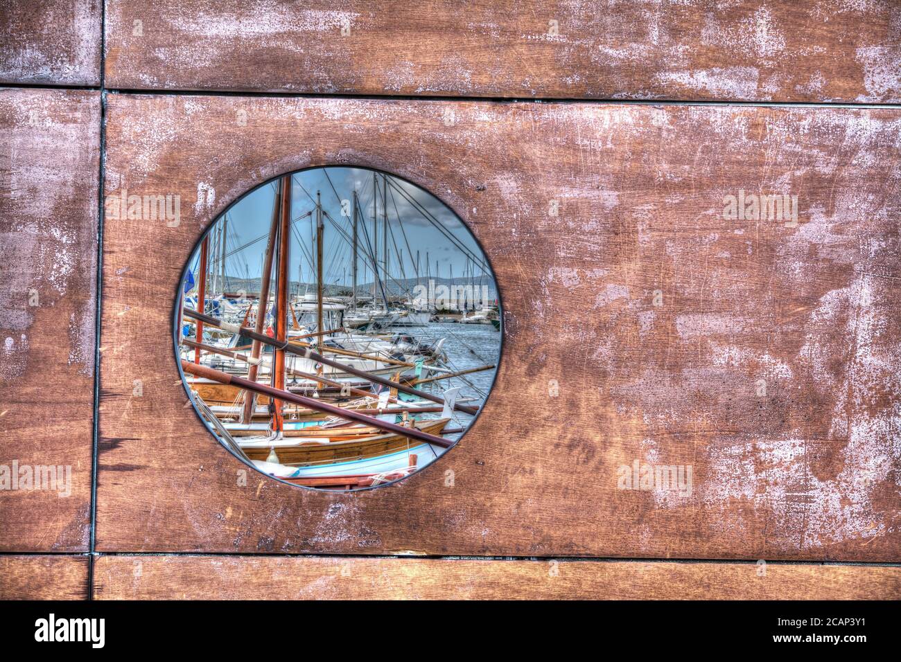 glimpse of the port through a porthole. Processed for hdr tone mapping ...