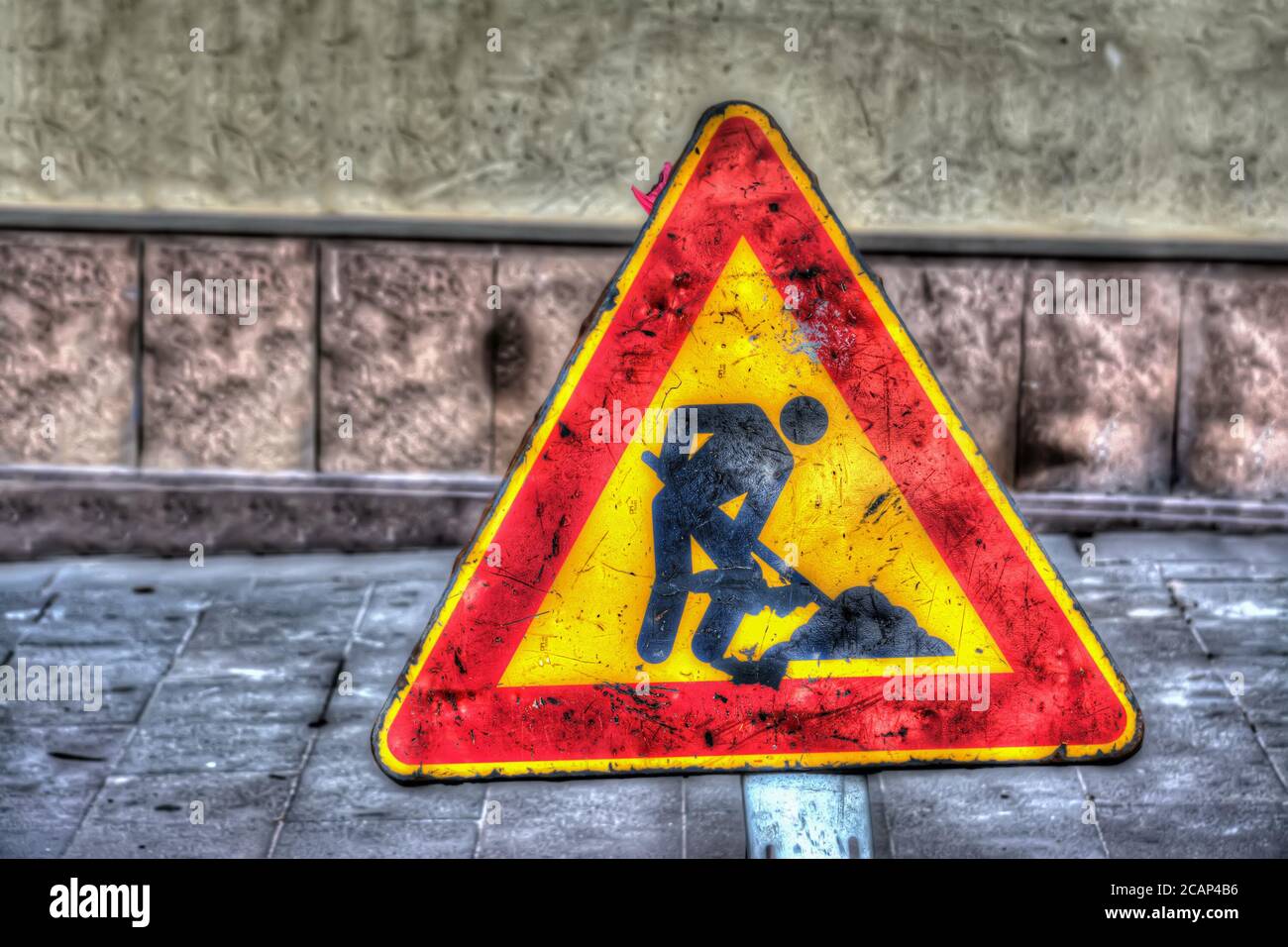 work in progress sign in a urban road. Processed for hdr tone mapping ...