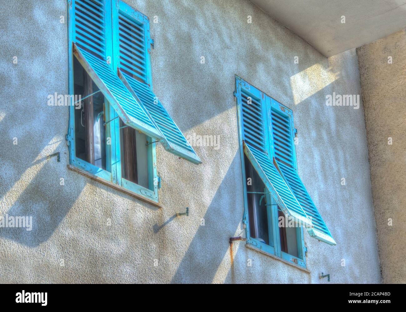 Open turquoise shutters hi-res stock photography and images - Alamy