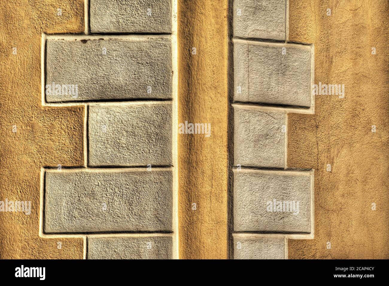 yellow wall corner with tiles. Processed for hdr tone mapping effect ...